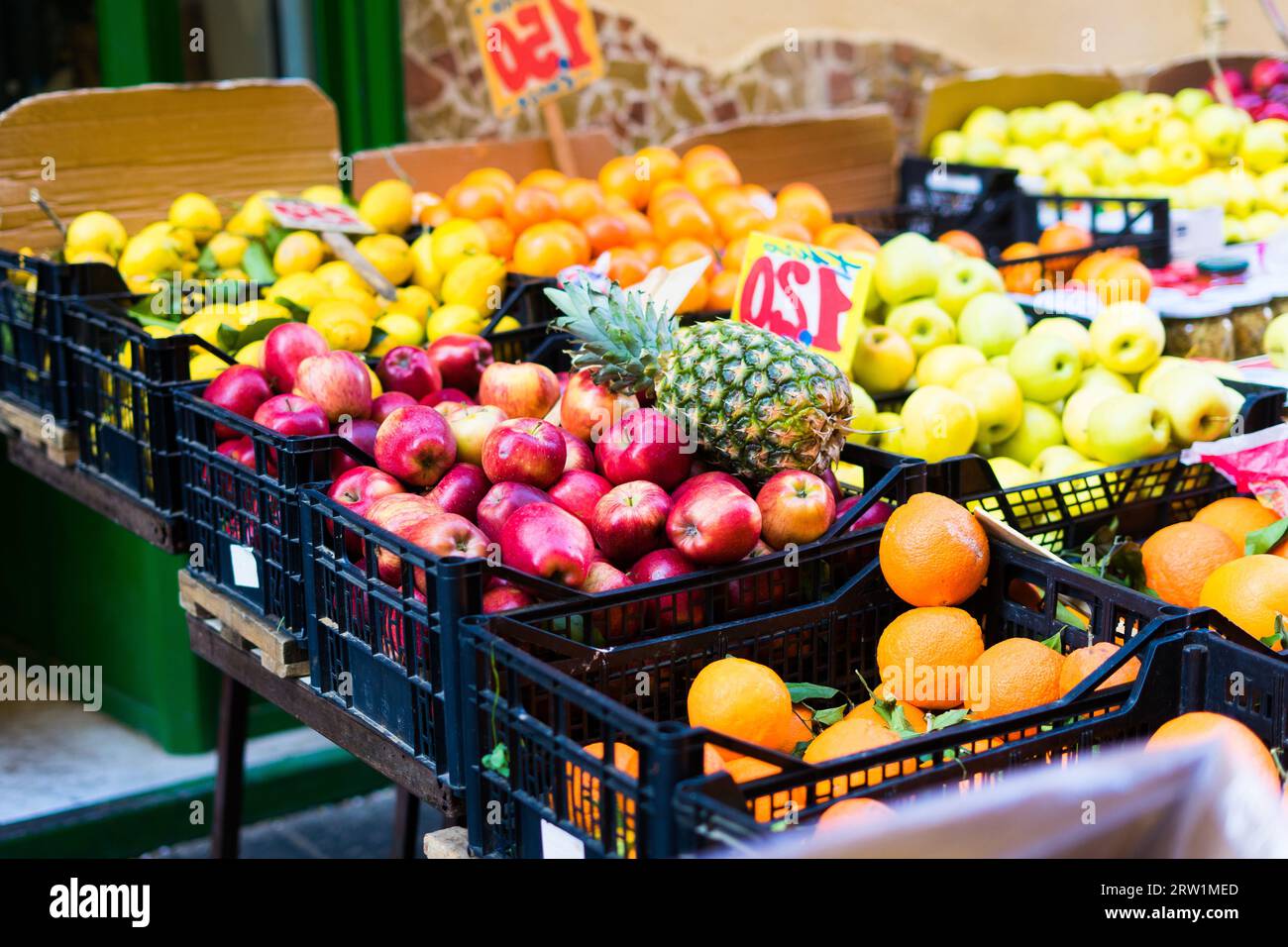 Open air market in Italy, different fruit. Madeira's fruits, pineapple ...