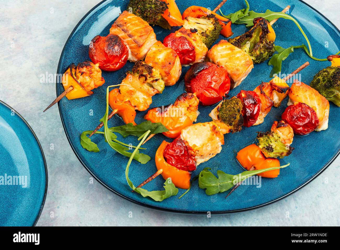 Grilled salmon fish kebab skewers with vegetables Stock Photo - Alamy