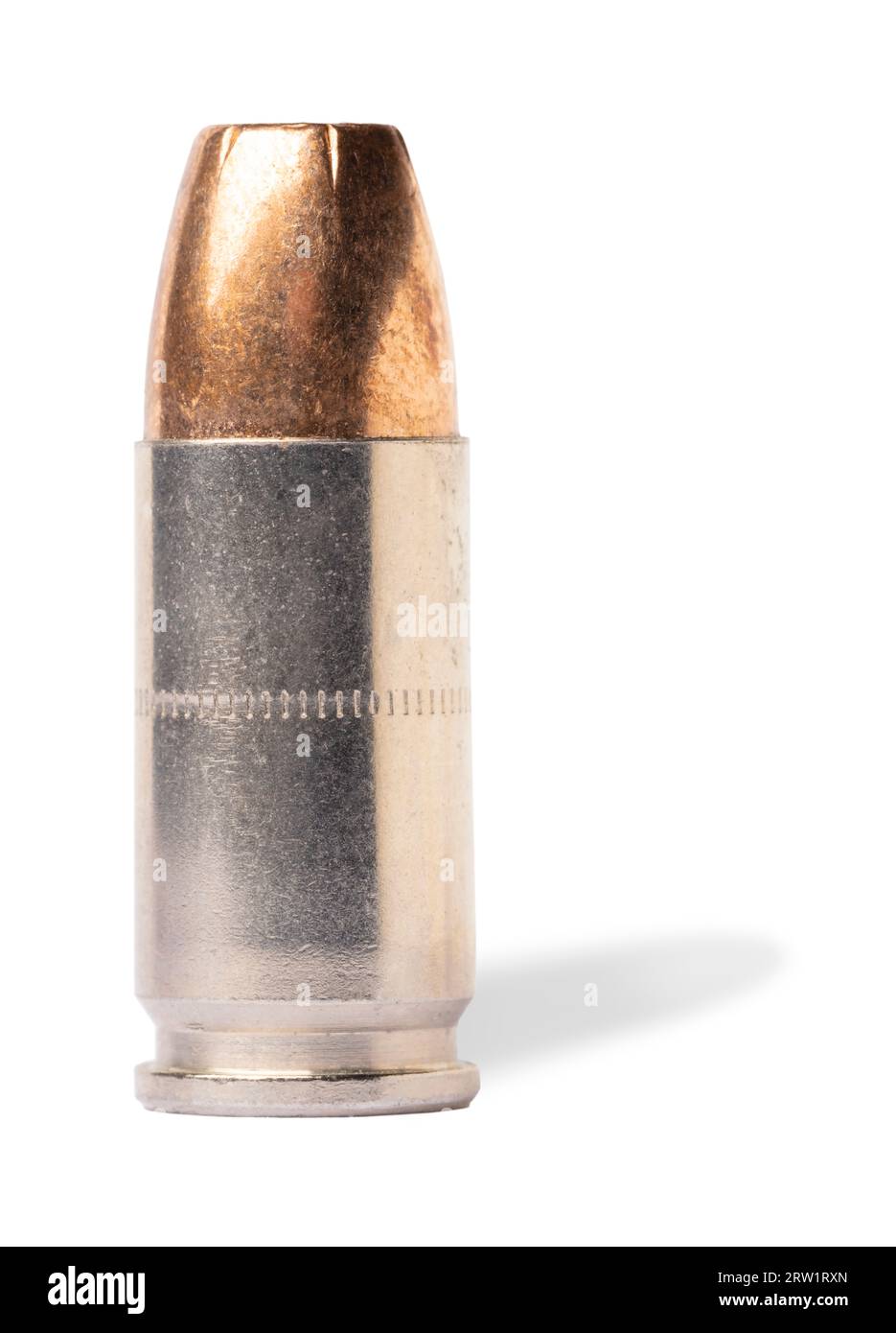Shadow behidn a silver 9 mm cartridge with jacketed hollow point bullet ...