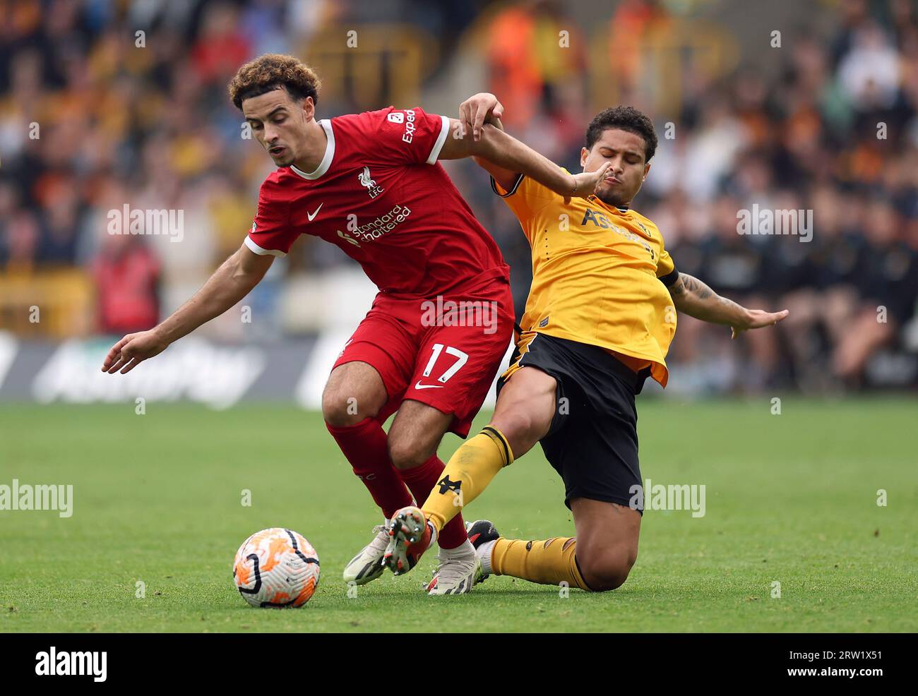 Liverpool's Curtis Jones and Wolverhampton Wanderers' Joao Gomes (right ...