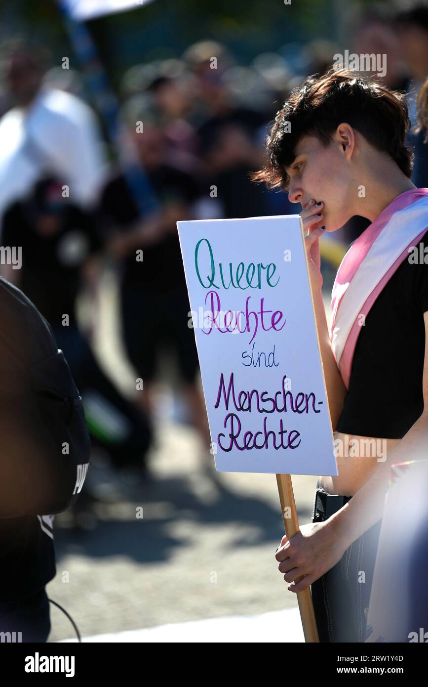 Schwerin, Germany. 16th Sep, 2023. A person with a banner reading ...