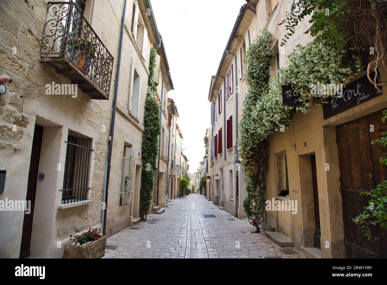the alleys of the small French town of "Uzès Stock Photo - Alamy