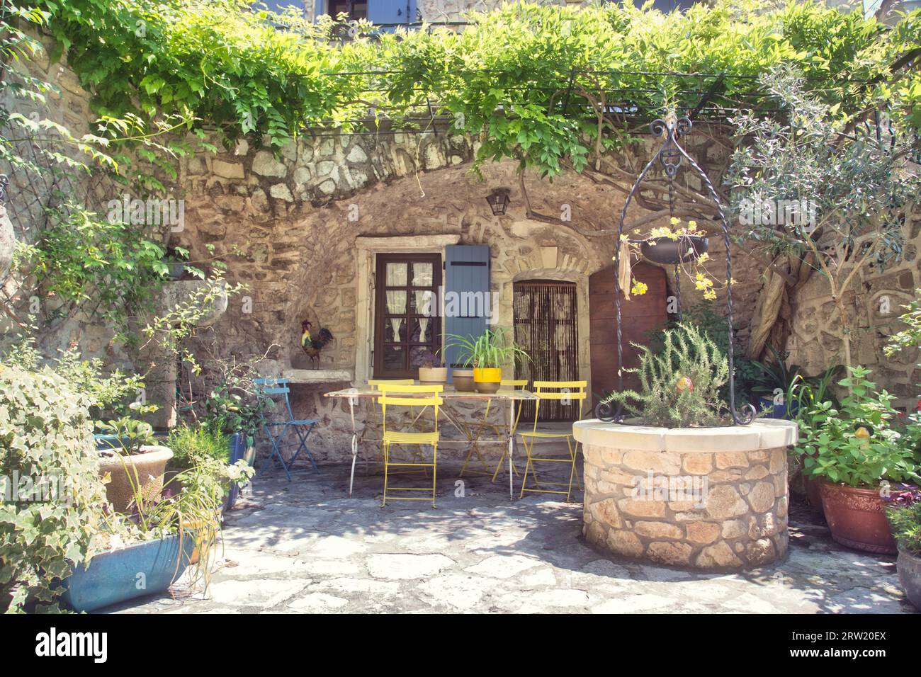 Beautiful overgrown terrace of an old stone house in Aiguèze (France ...