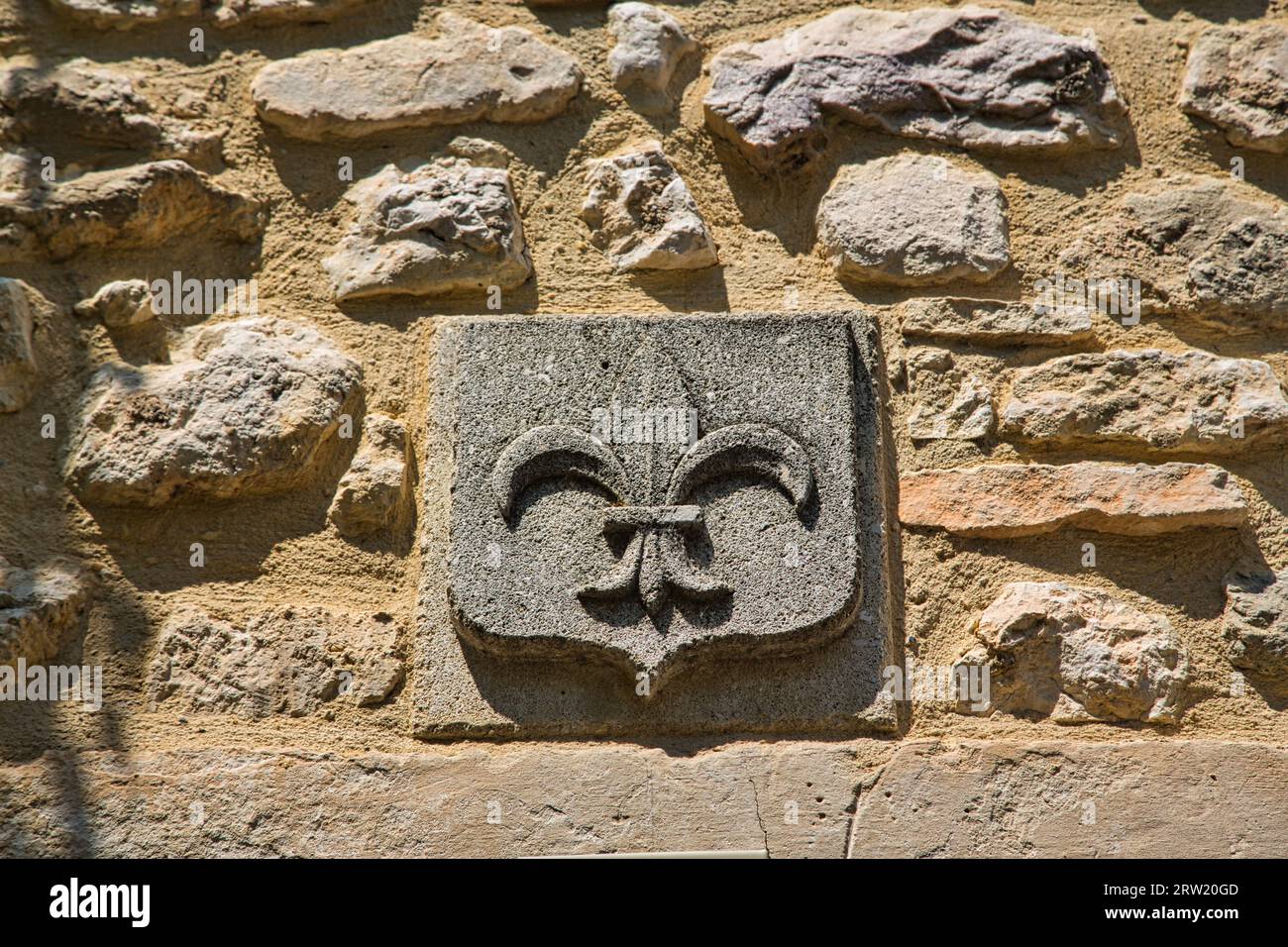 a stone symbol over a french house entrance Stock Photo - Alamy