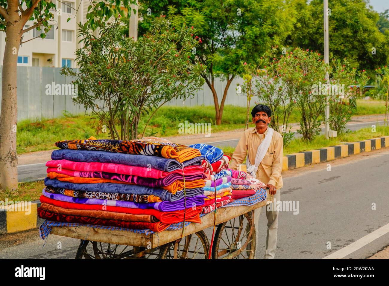 Puttaparthi, India-September 01.2023: Indian street vendor man selling ...