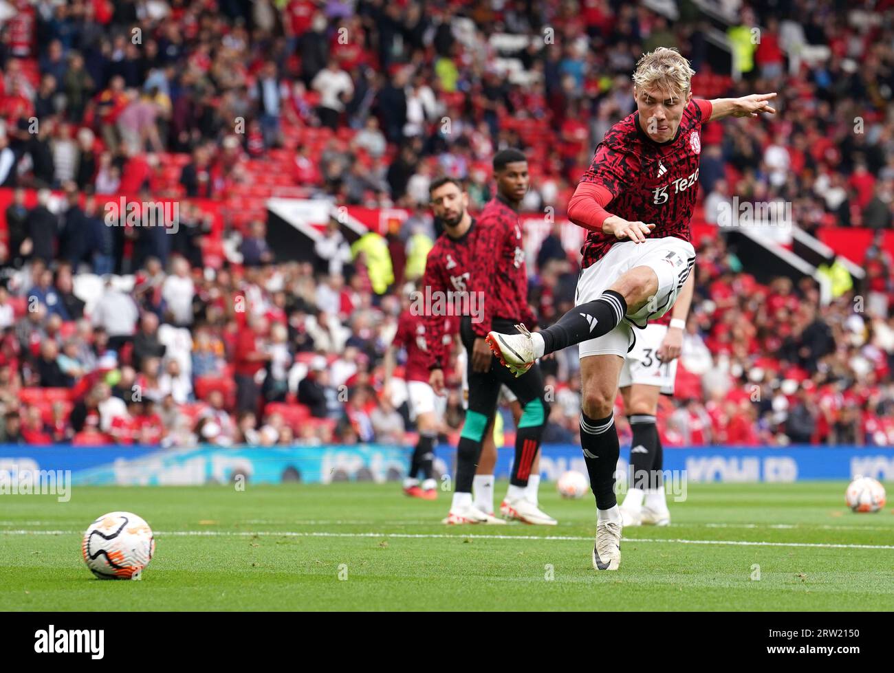 Manchester United's Rasmus Hojlund warming up before the Premier League match at Old Trafford ...