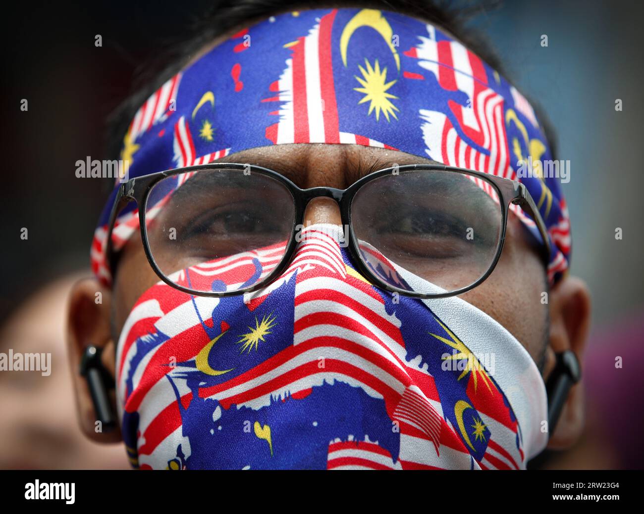 Kuala Lumpur, Malaysia. 16th Sep, 2023. Protester wears headband and ...