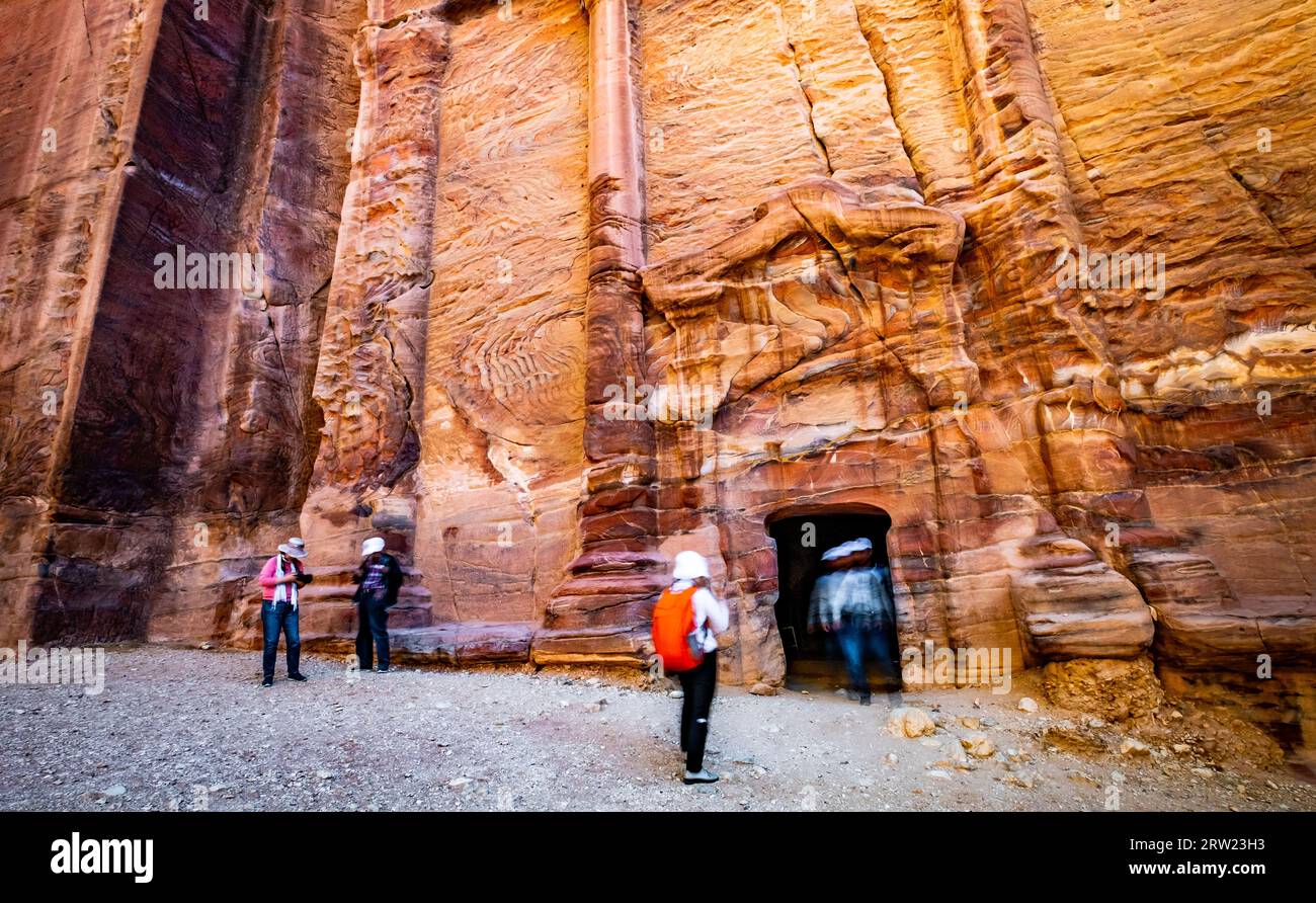 Entrance of underground ancient rock carving, royal tomb in Petra ...