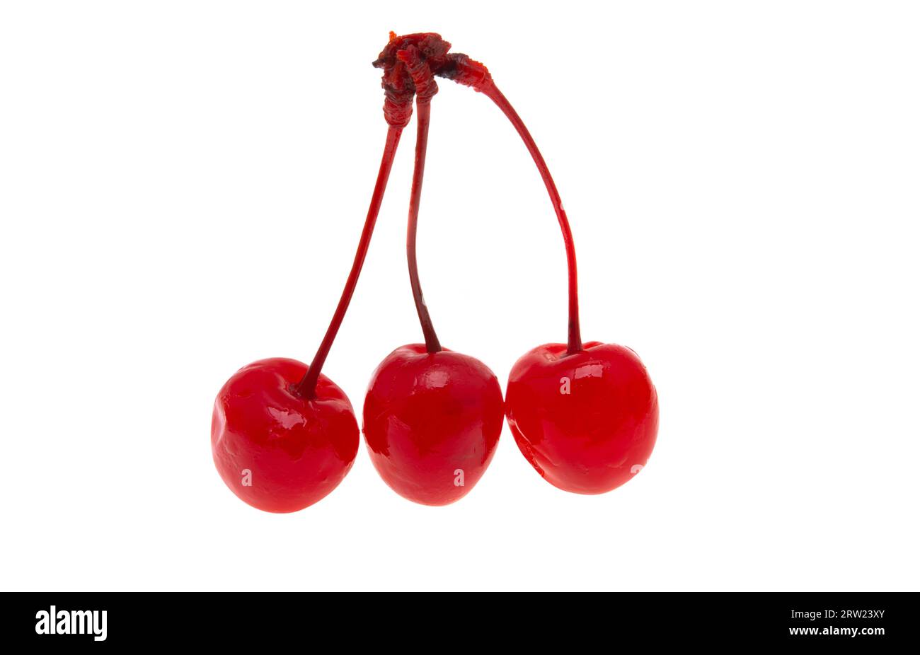 maraschino cherry isolated on a white background Stock Photo - Alamy