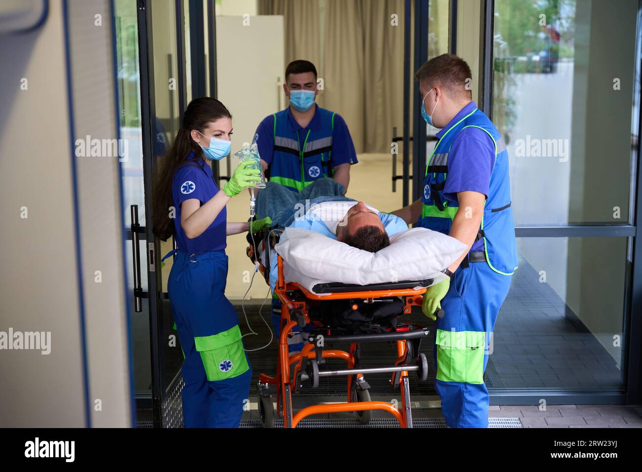 Ambulance doctors took the man to the emergency room Stock Photo - Alamy