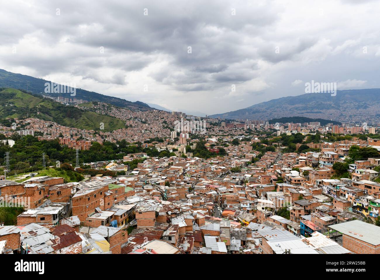 Colorful streets of Comuna 13 district in Medellin, Colombia, a former ...