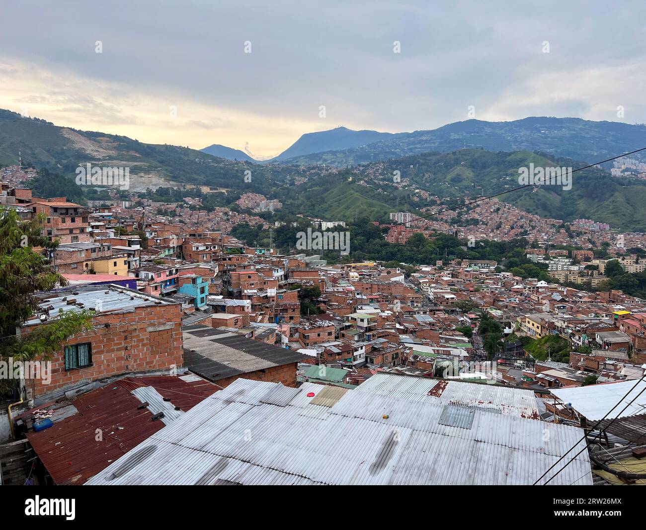 Colorful streets of Comuna 13 district in Medellin, Colombia, a former ...
