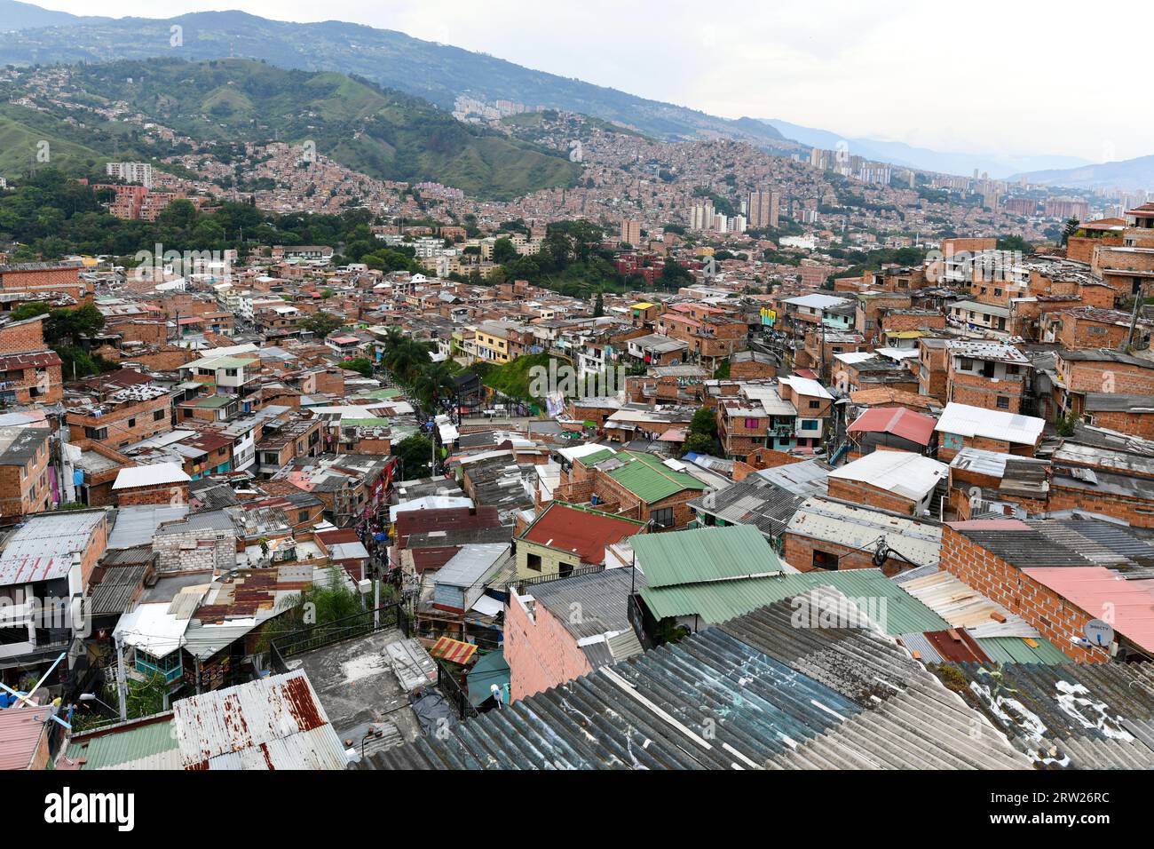 Colorful streets of Comuna 13 district in Medellin, Colombia, a former ...