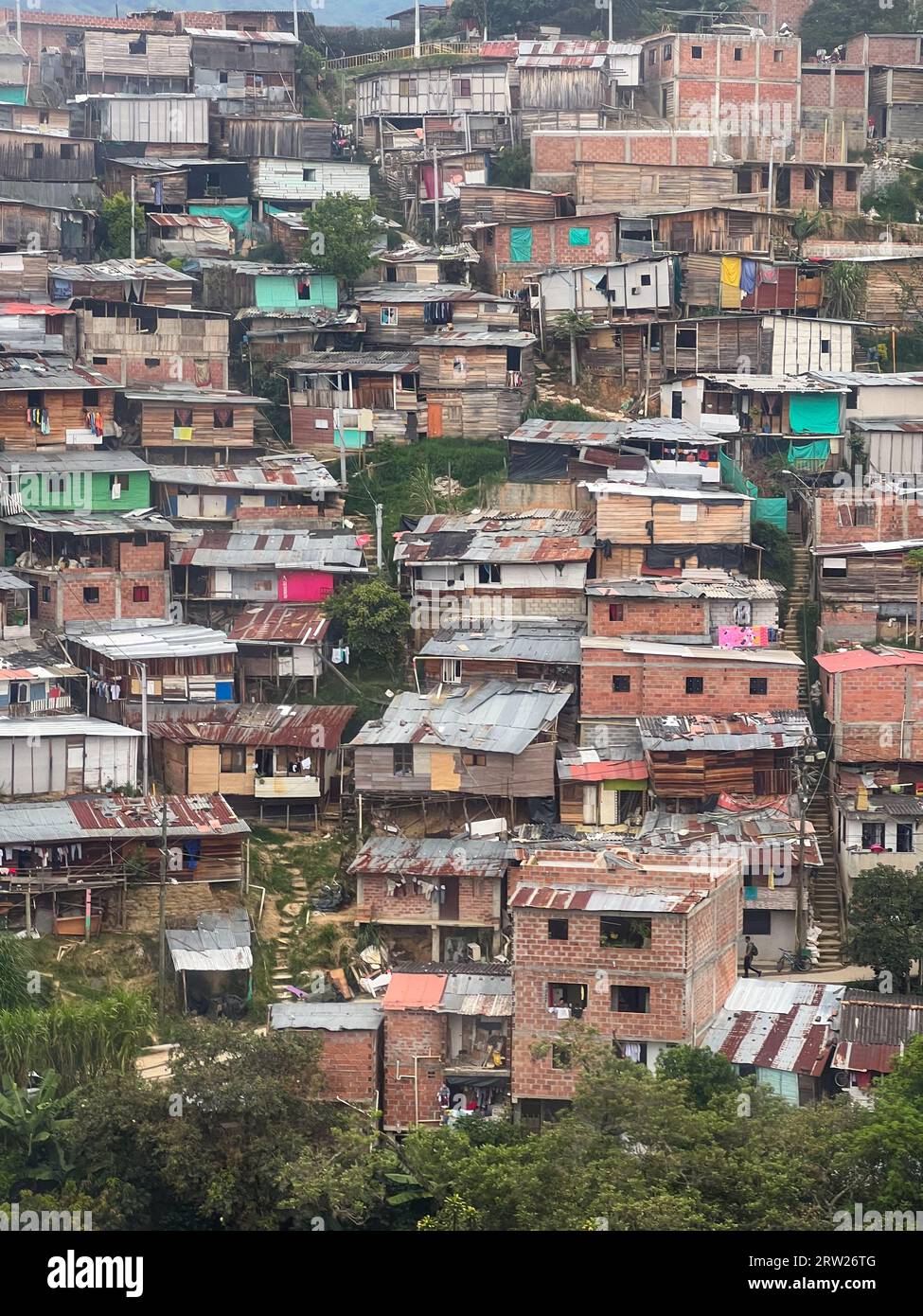 Colorful streets of Comuna 13 district in Medellin, Colombia, a former ...
