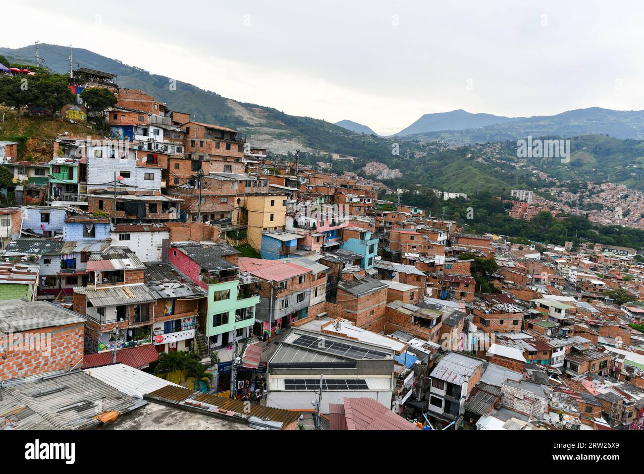 Colorful streets of Comuna 13 district in Medellin, Colombia, a former ...