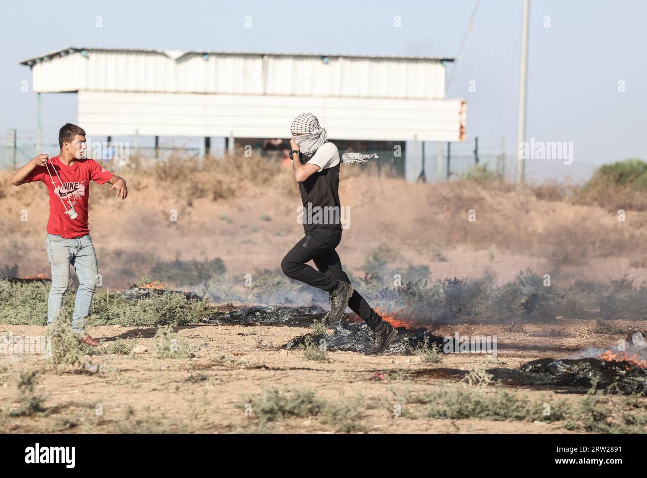 Gaza, Palestine. 15th Sep, 2023. A Palestinian protester uses a ...