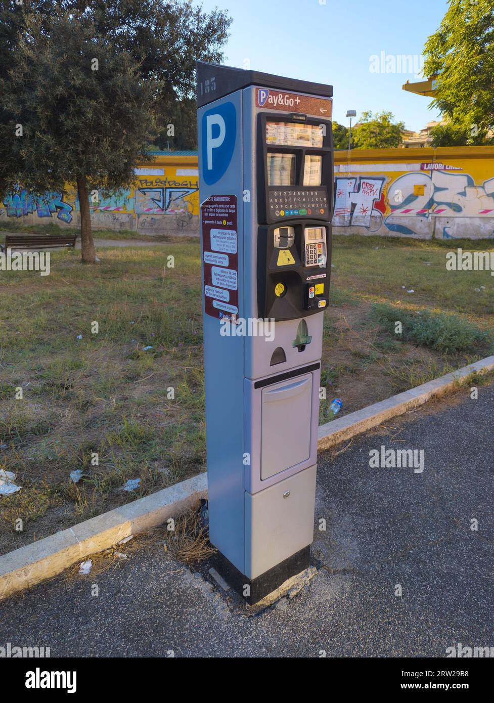 Parking meter in a street in Celio Rome Italy Stock Photo - Alamy