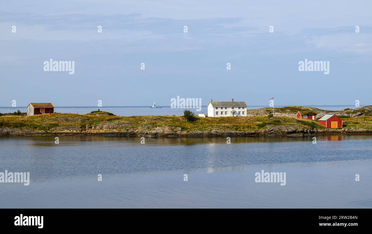 Remote houses neat the open Atlantic Ocean at Langøya (Hustadvika, Møre ...
