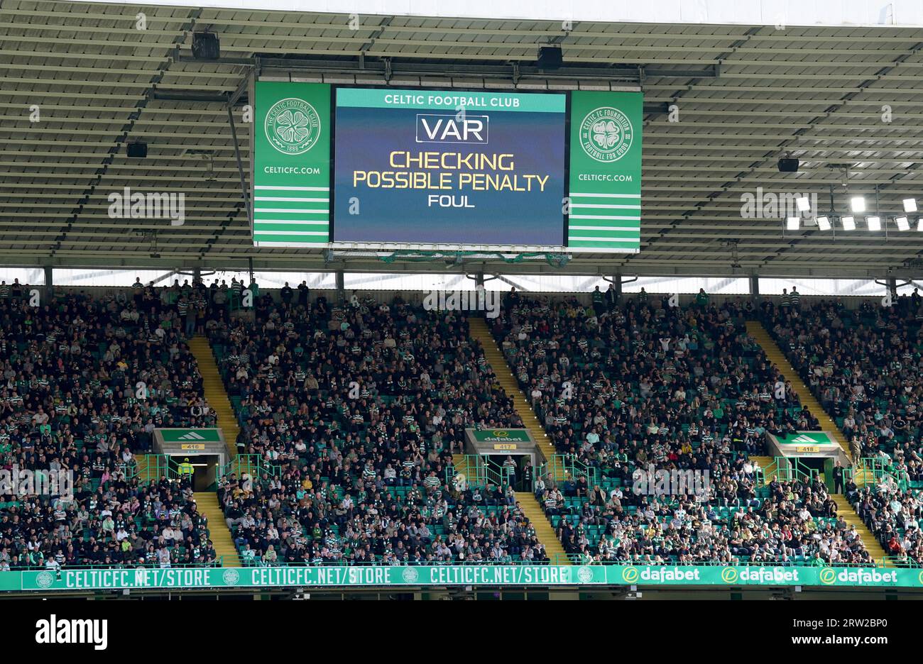 The stadiums big screen shows a VAR check for a possible penalty which ...