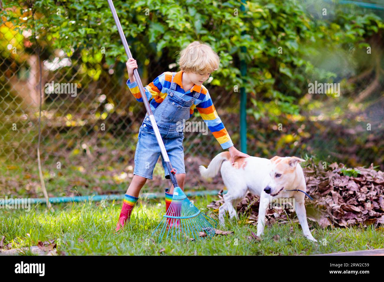 Child rake hi-res stock photography and images - Alamy
