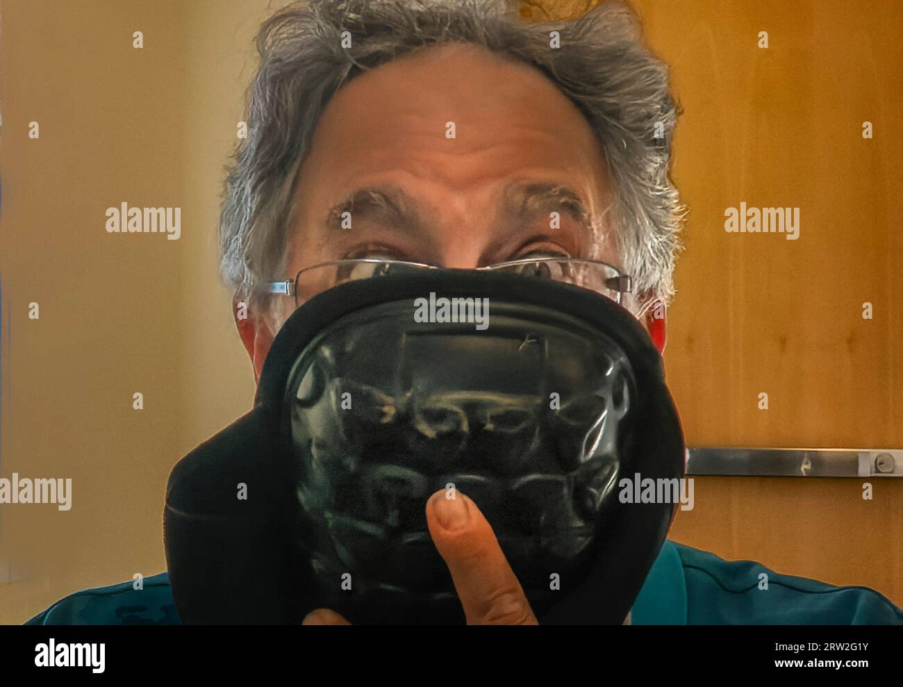 Man covering his face hi-res stock photography and images - Alamy