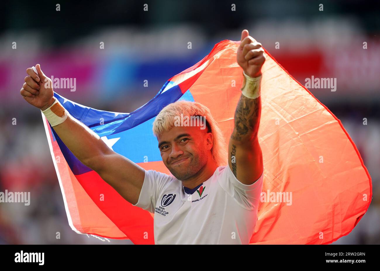 Samoa's Jonathan Taumateine celebrates their win during the Rugby World ...