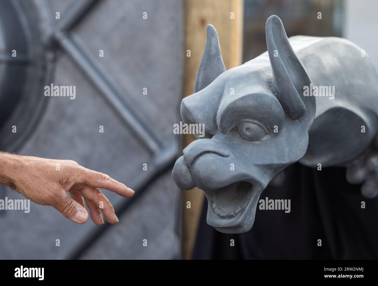 Paris, France. 16 Sep 2023: A French craftsman points at a model of a ...