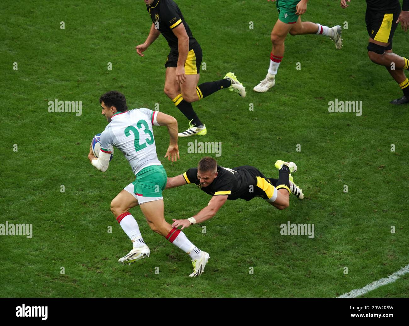 Portugal's Raffaele Storti tackled by Wales' Gareth Anscombe during the ...
