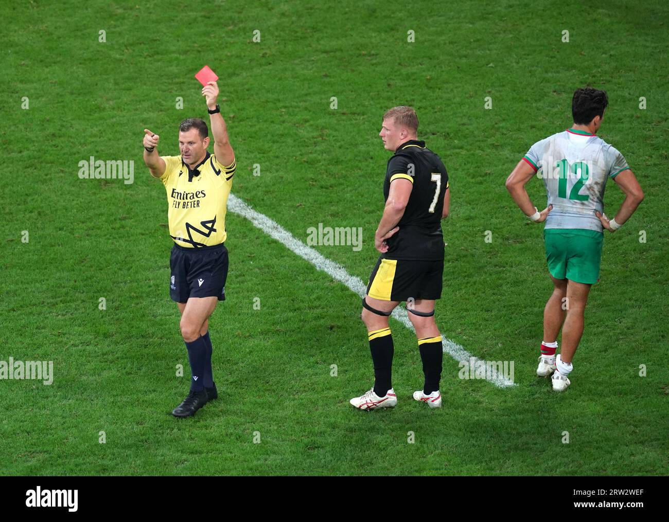 Referee Karl Dickson shows a red card to Portugal's Vincent Pinto (not ...