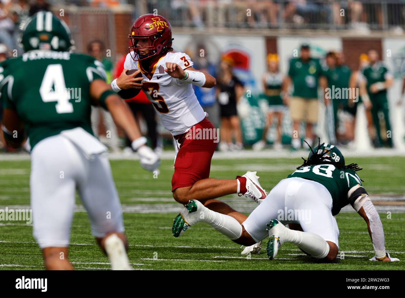 Iowa State quarterback Rocco Becht, center, tries to get past Ohio ...