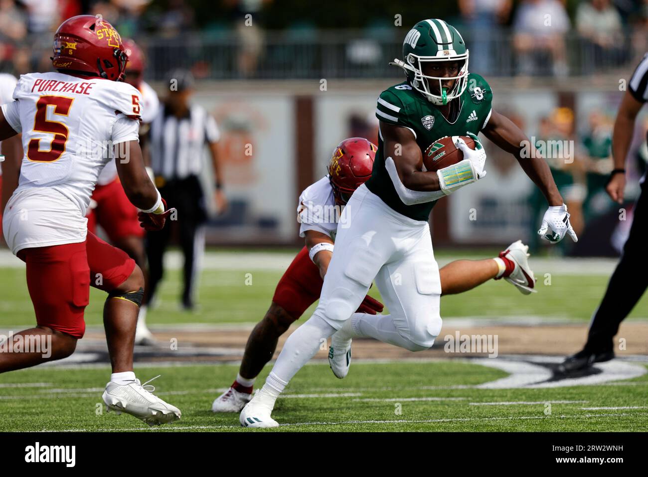 Ohio wide receiver Jacoby Jones, right, gets past Iowa State defensive ...