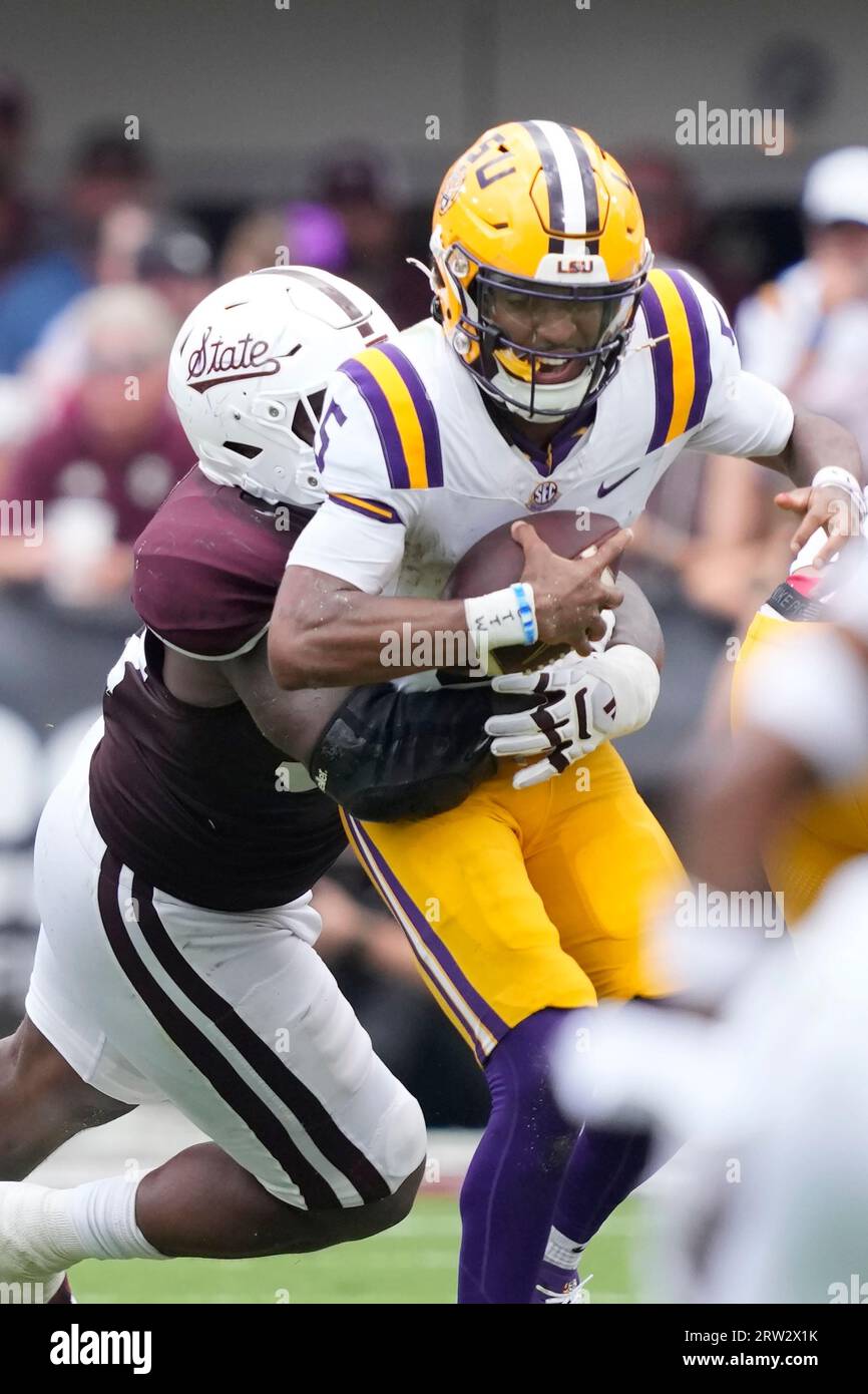 LSU quarterback Jayden Daniels (5) is sacked by Mississippi State ...