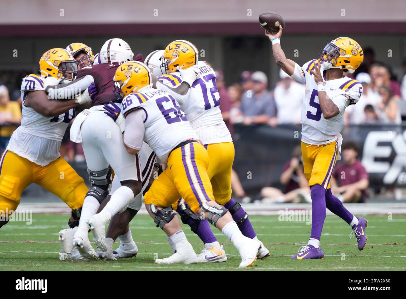 LSU quarterback Jayden Daniels (5) throws a pass against Mississippi ...