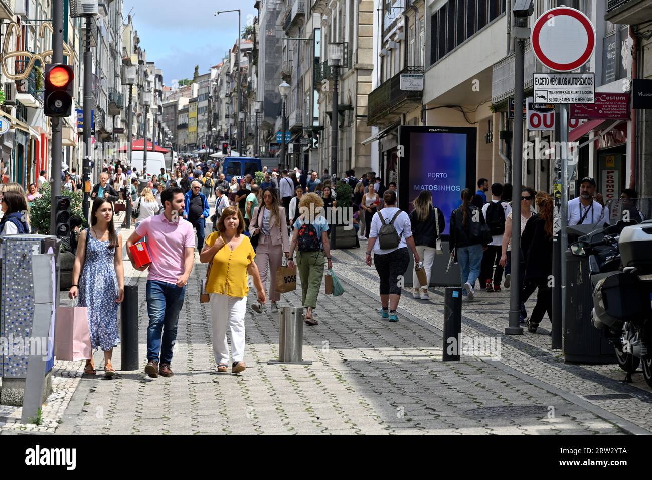 Pedestrianized street (Rua Formosa) packed with people walking and ...