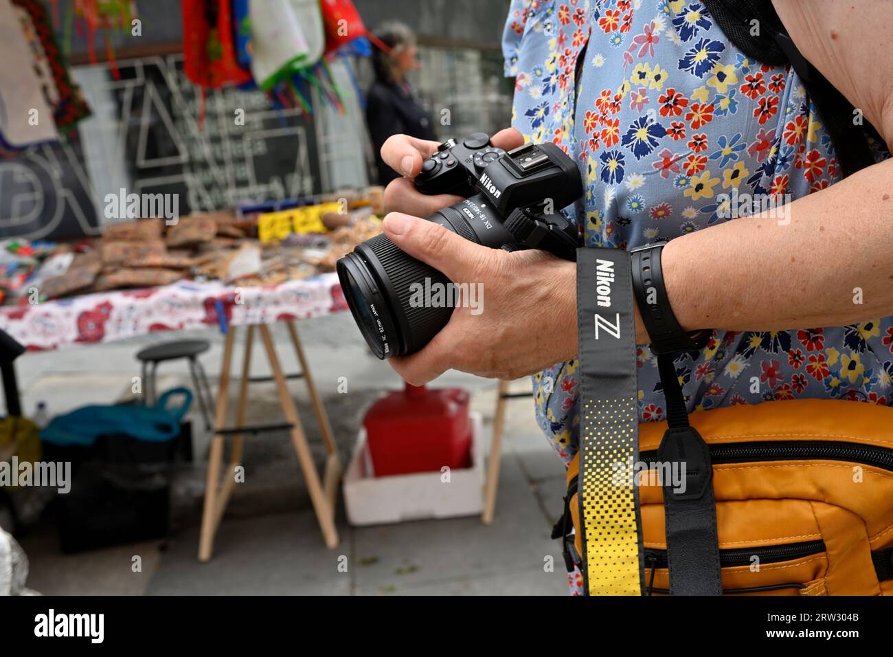 Woman with Nikon Z digital camera Stock Photo - Alamy