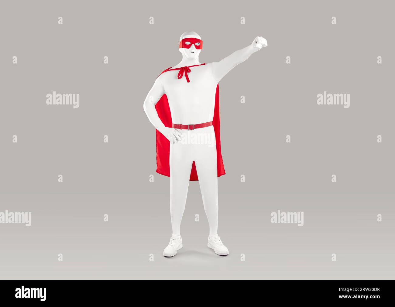 Portrait of faceless unrecognizable person in a superman pose wearing a ...