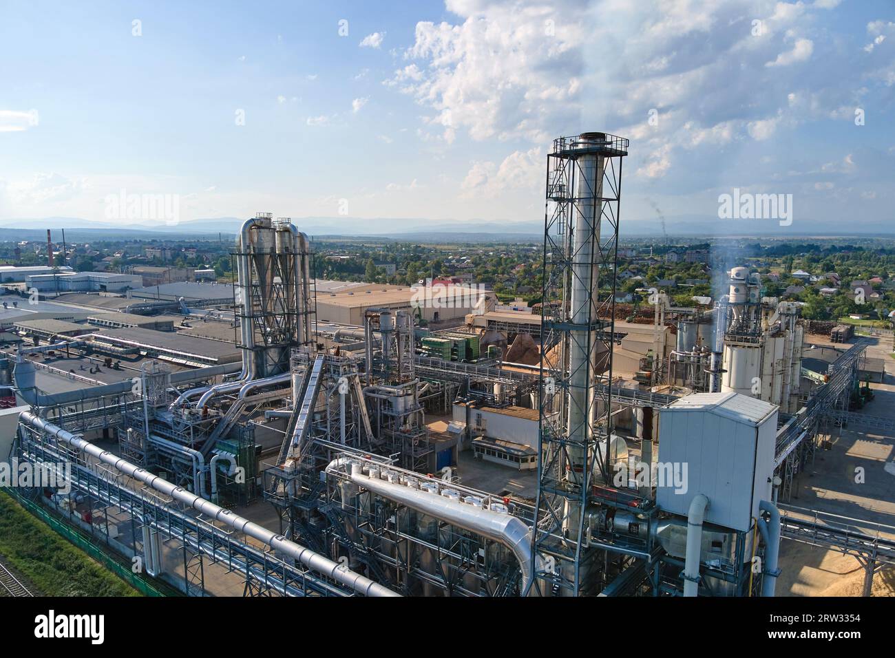Aerial view of oil and gas refining petrochemical factory with tall ...