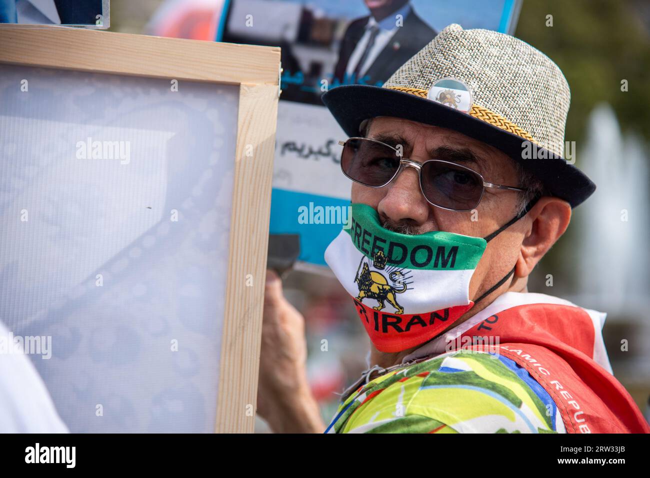 London, UK. 16th Sep, 2023. A protestor wears a face mask during the ...