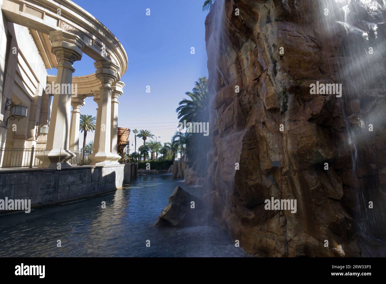 Majestic Stone Cascade: A Tranquil Oasis in a Bustling World Stock ...