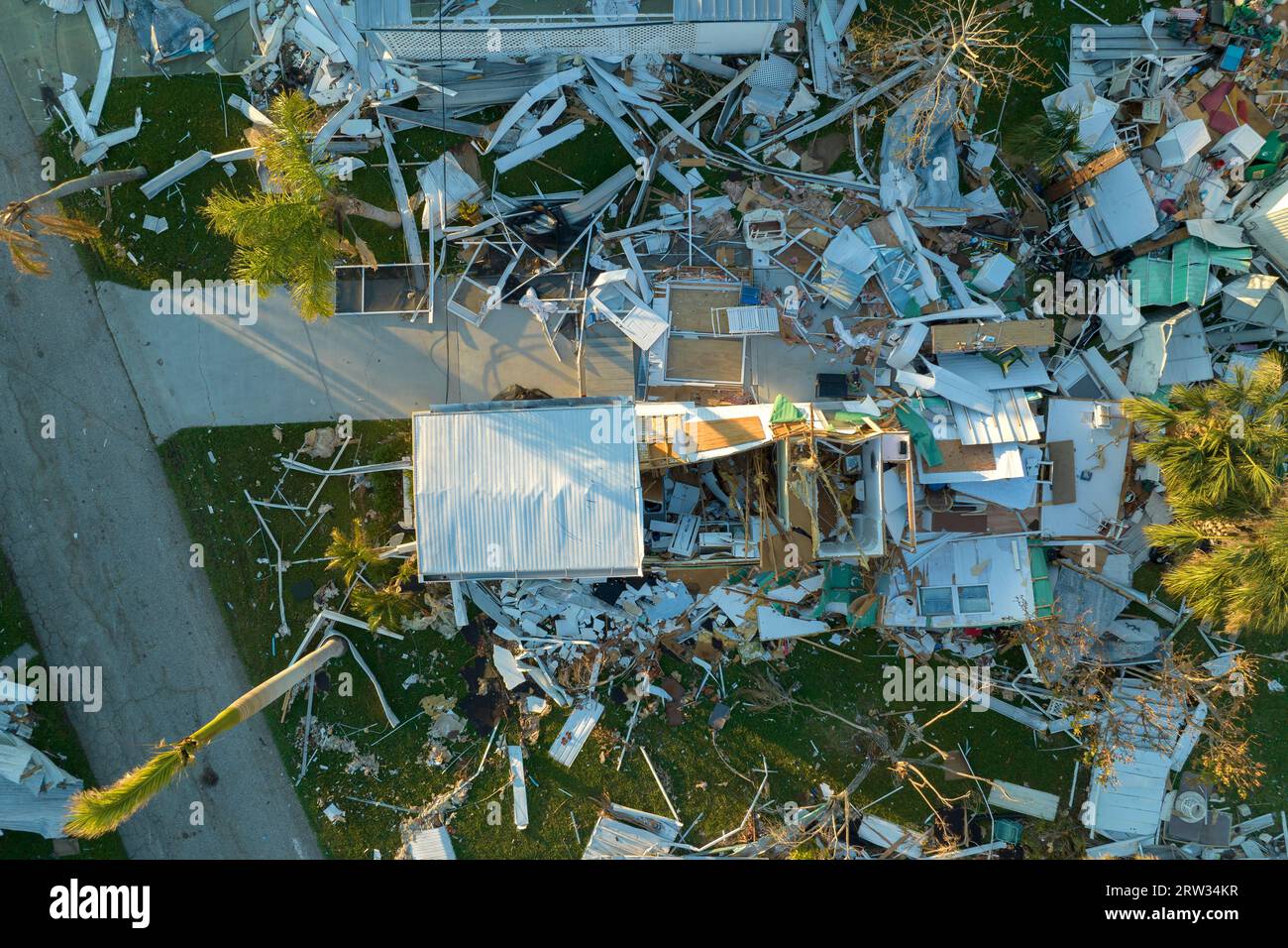 Collapsed and damaged mobile homes after hurricane Ian swept through Florida residential area ...