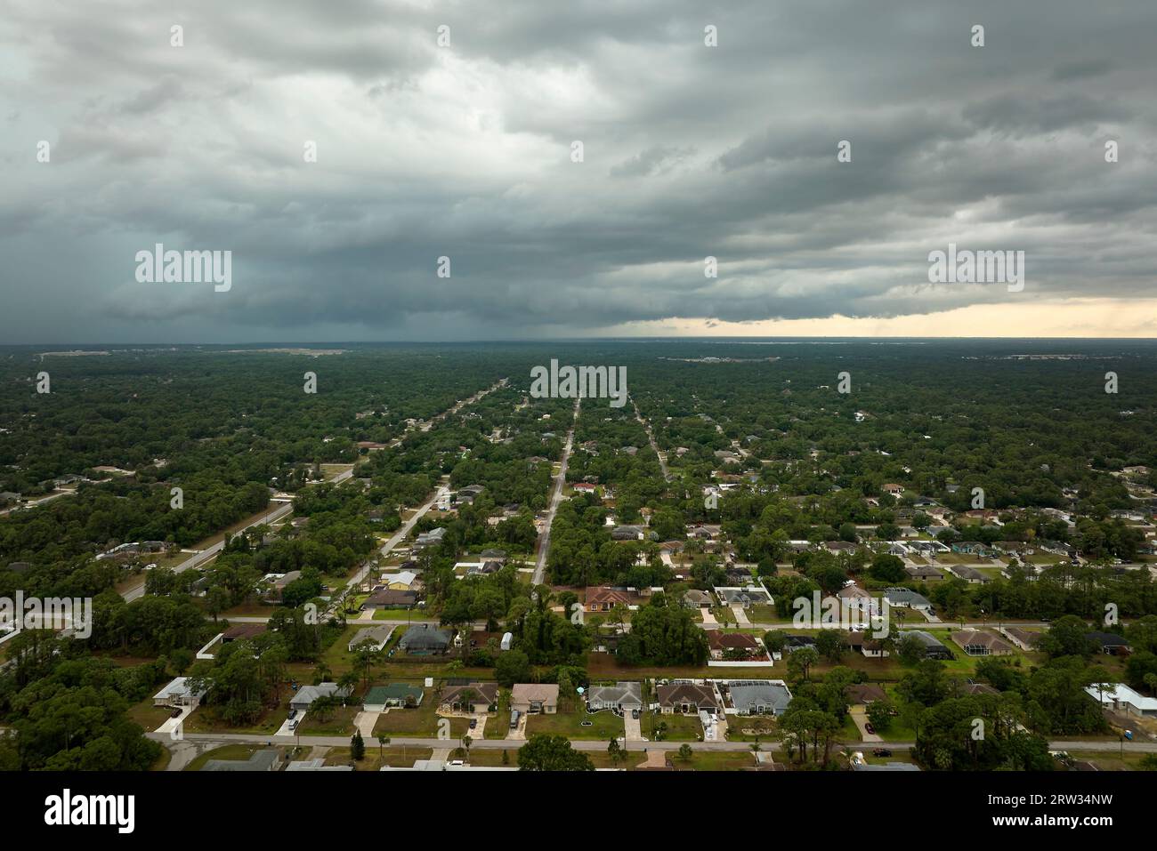 Dark stormy clouds forming on gloomy sky before heavy rainfall over ...