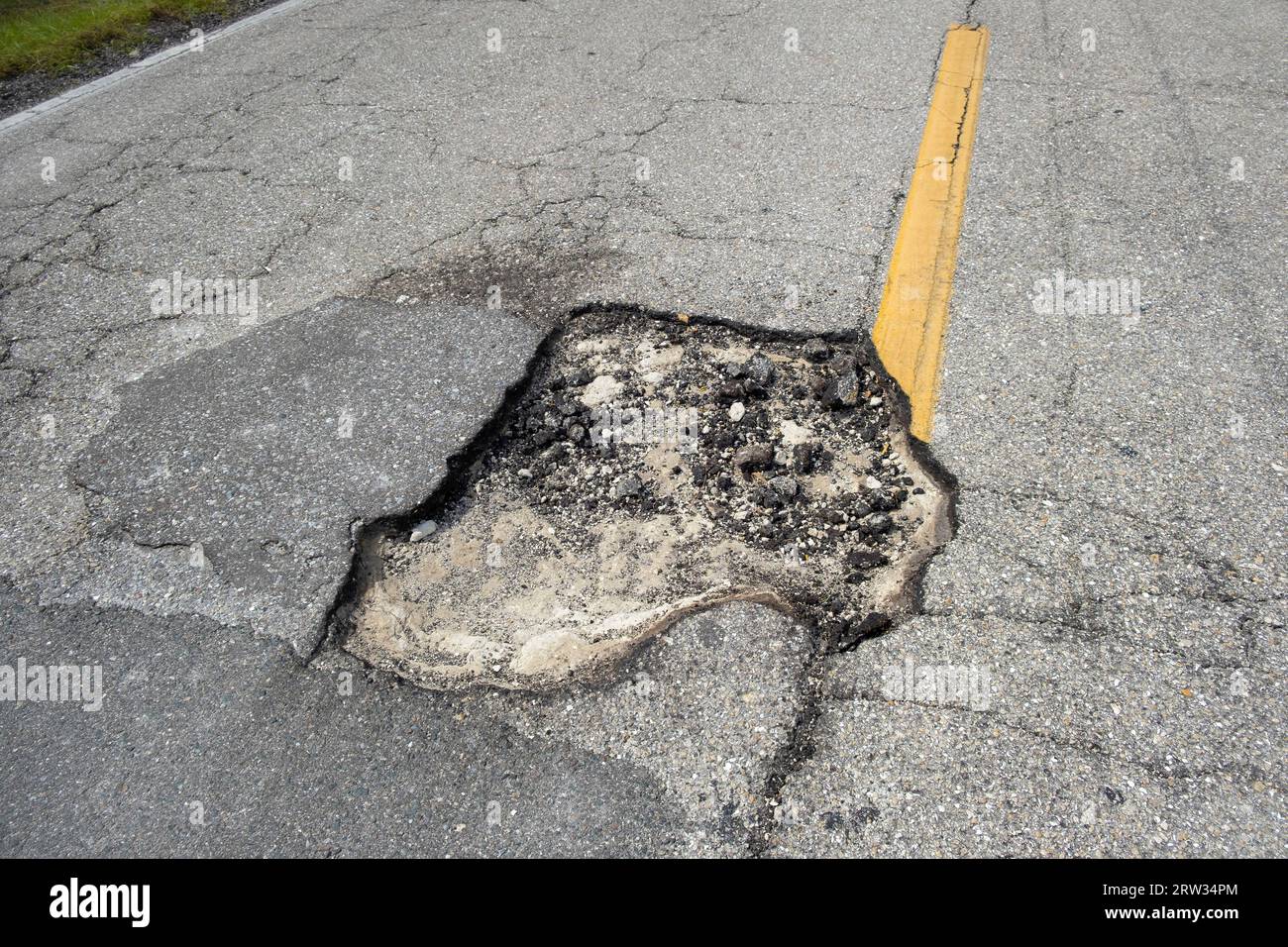 Deep crack in asphalt hi-res stock photography and images - Alamy