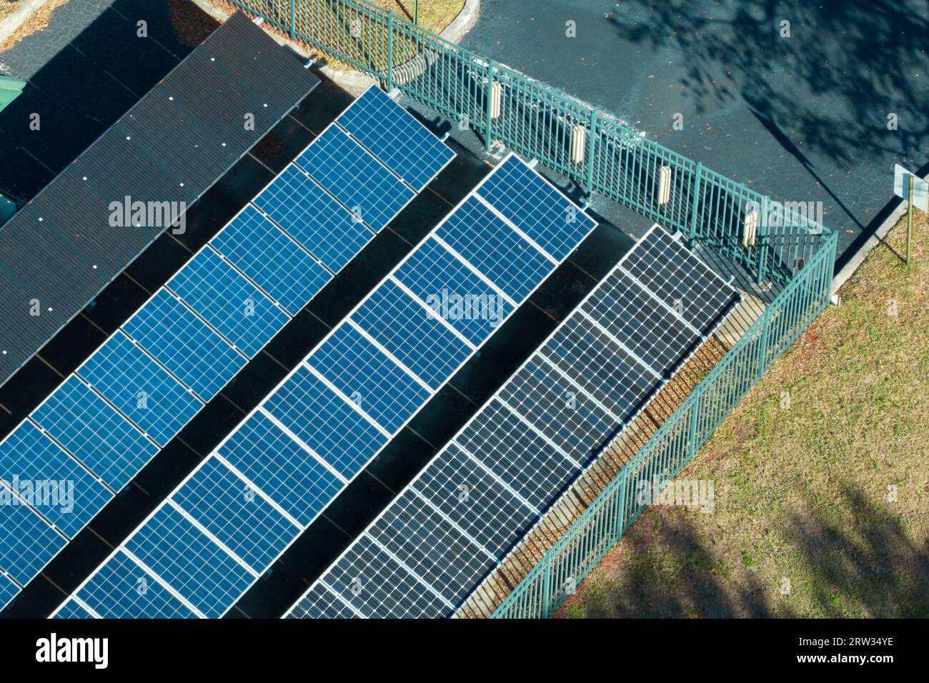 Fenced backyard facility with solar photovoltaic panels for producing ...