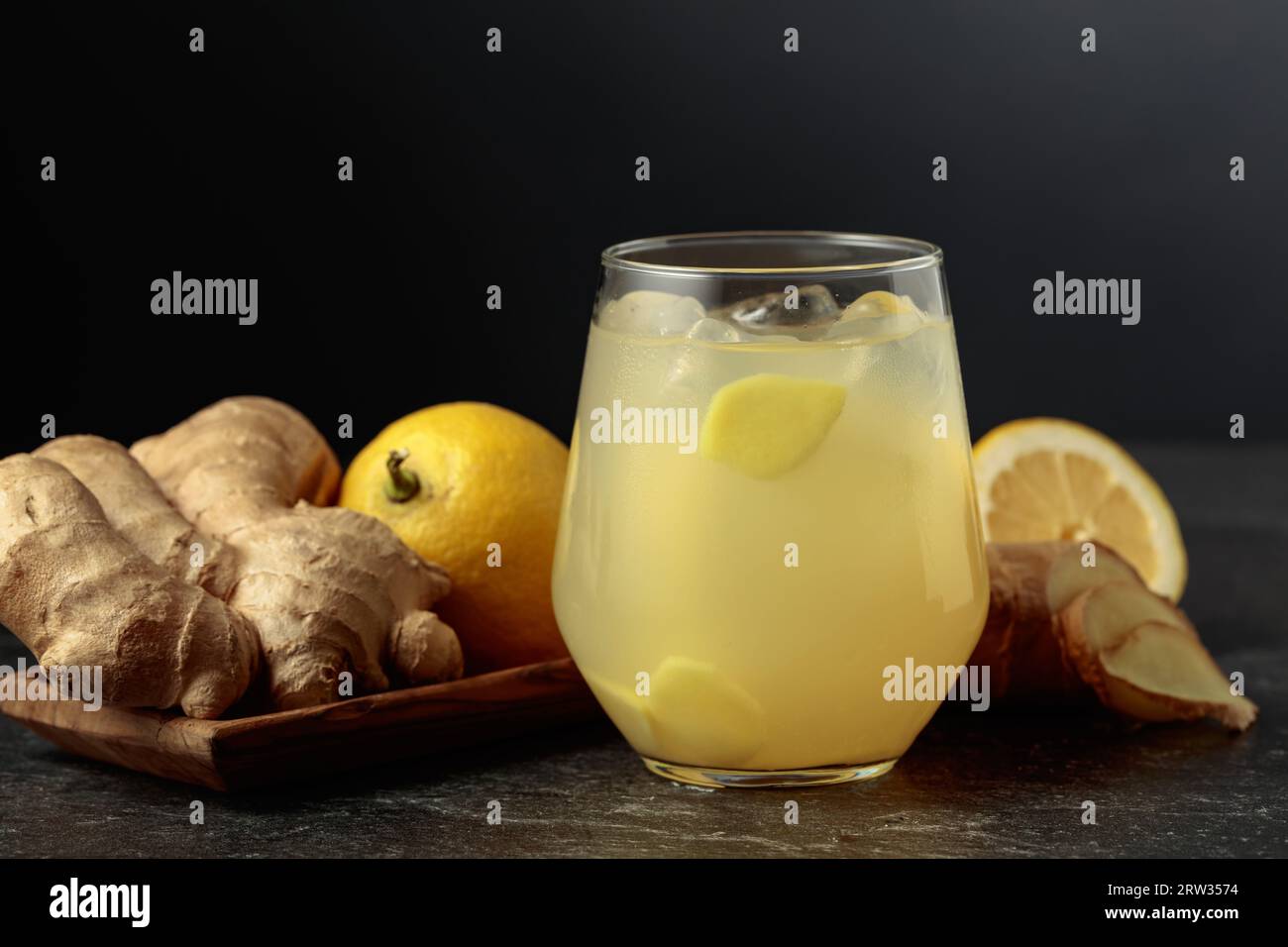 Ginger Ale with ice and lemon. Homemade lemon and ginger organic ...