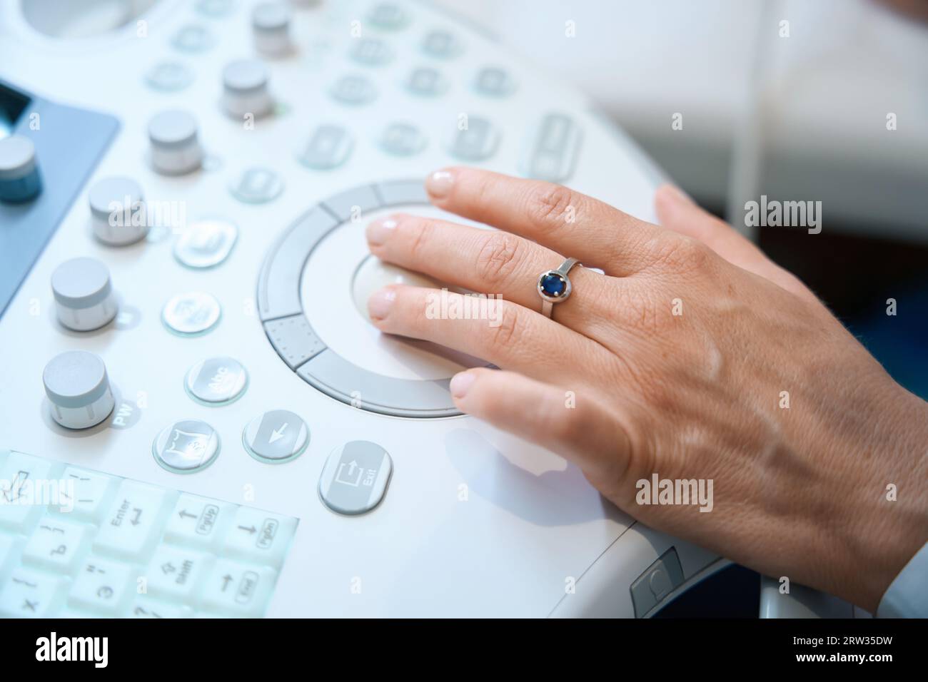 Doctor uses medical machine close hi-res stock photography and images ...
