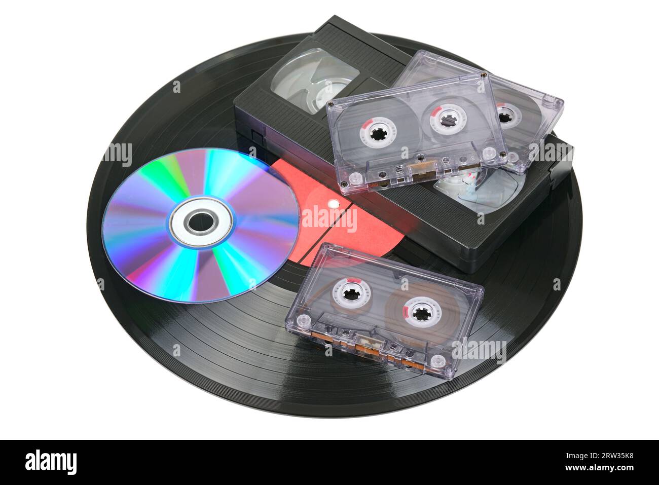 Vinyl disc, audio and video cassettes isolated on white background ...