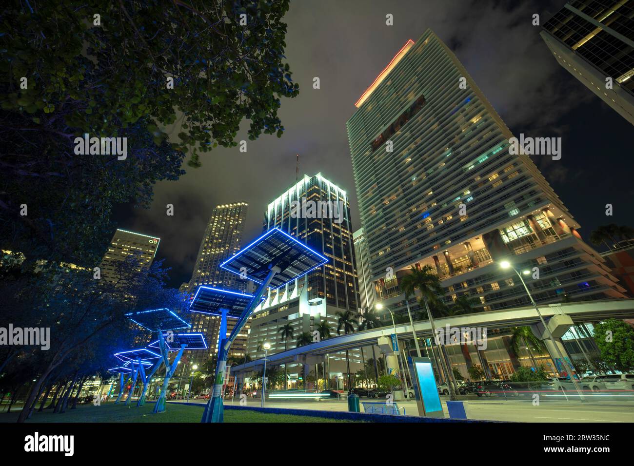 Modern urban street neon illumination with solar photovoltaic panels ...