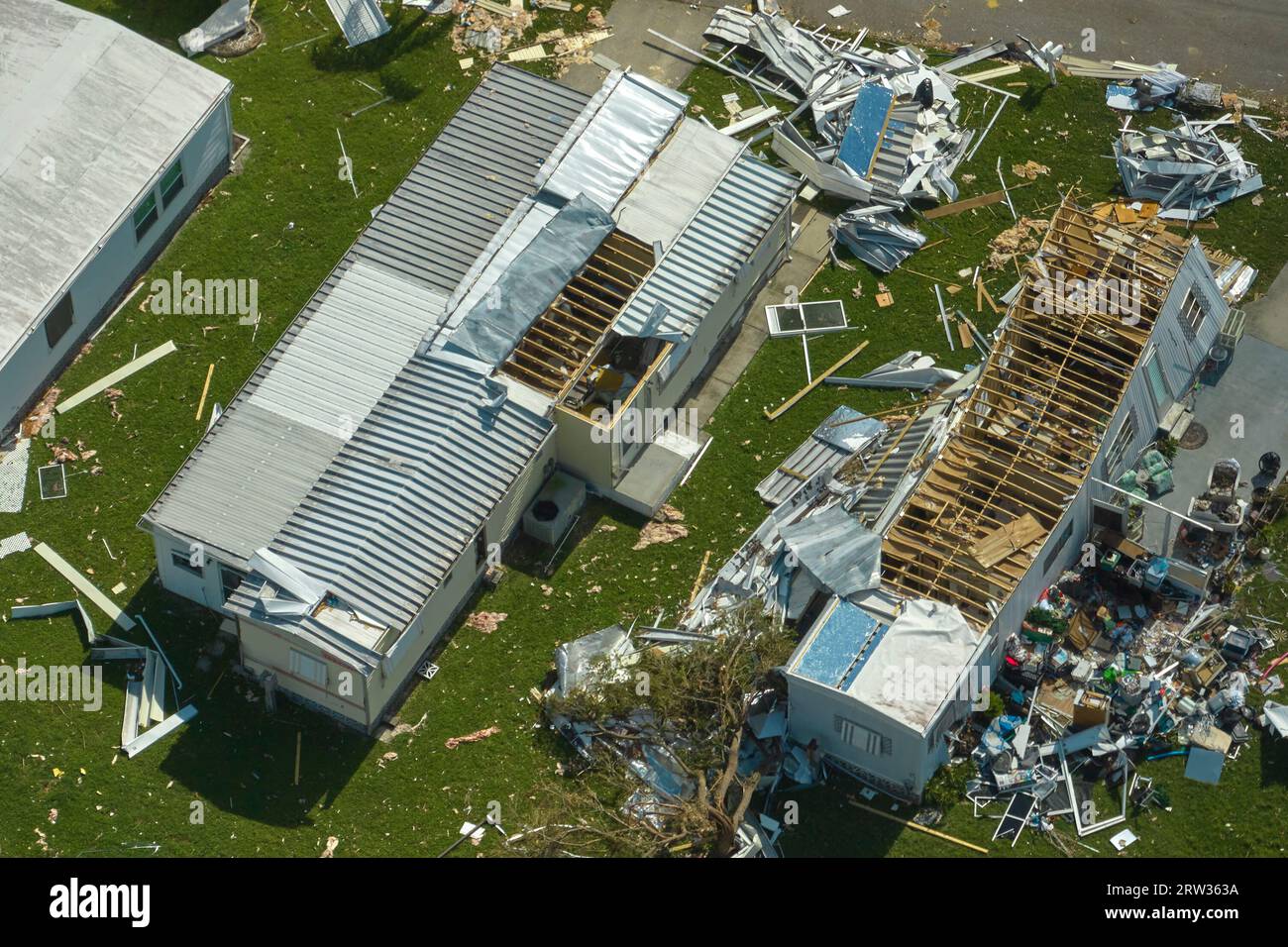 Severely damaged houses after hurricane Ian in Florida mobile home ...