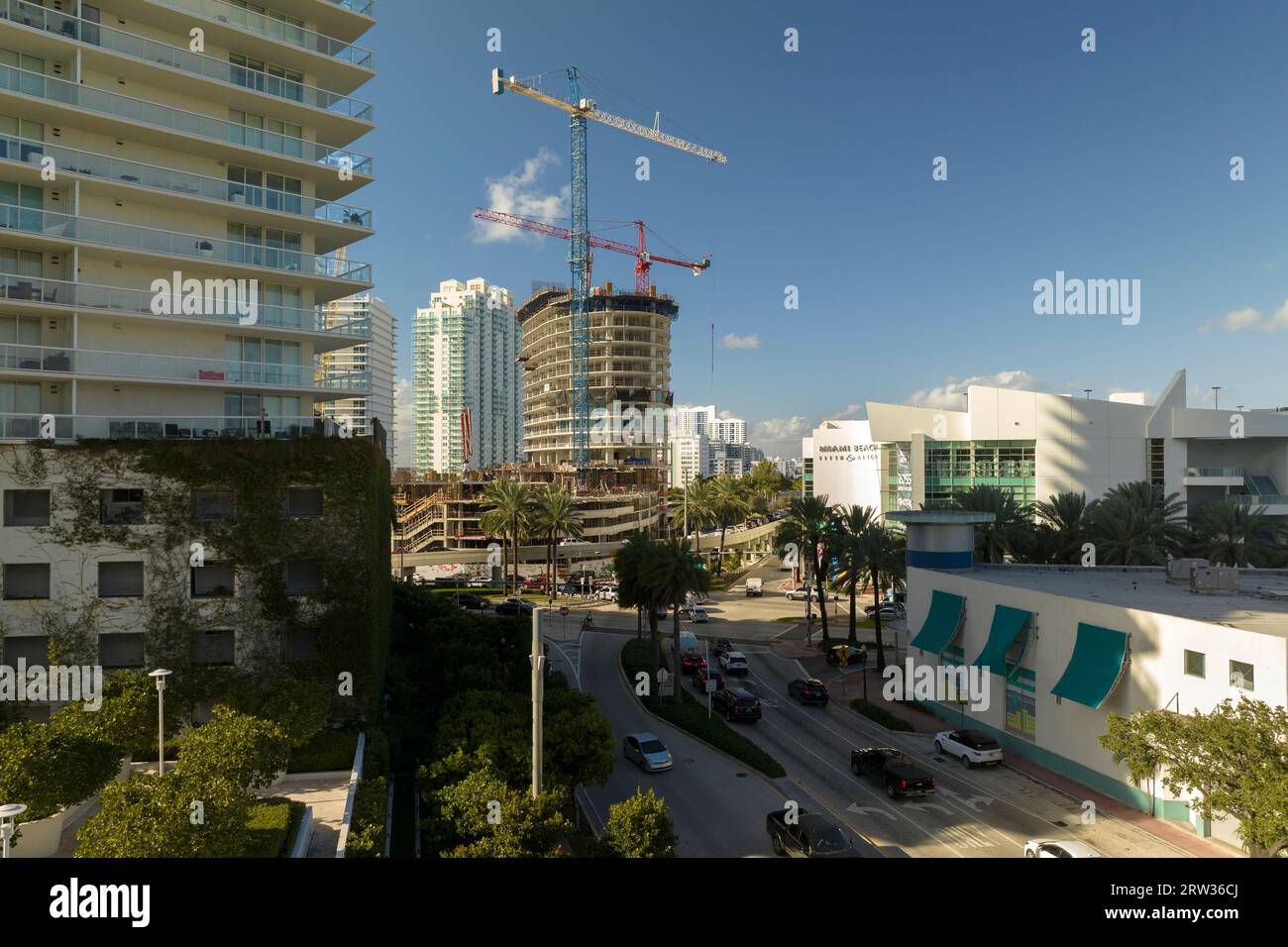 Tower lifting cranes at high residential apartment building ...