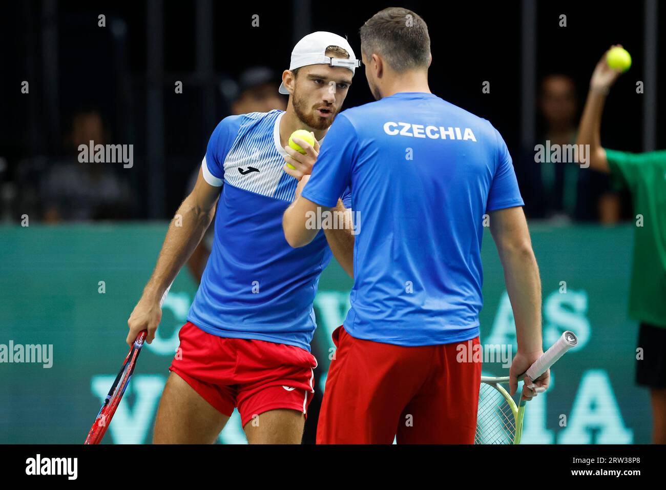 Czech tennis players Adam Pavlasek (right) and Tomas Machac (left) in action during the 2023 ...
